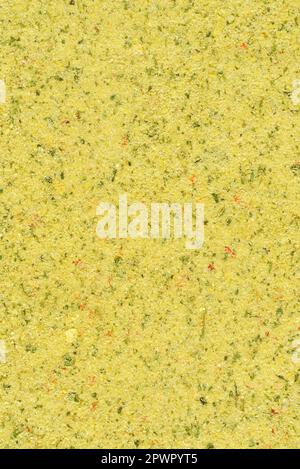 Yellow chicken stock powder seasoning texture or background Stock Photo ...