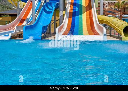 Colorful kids waterpark and a swimming pool Stock Photo - Alamy
