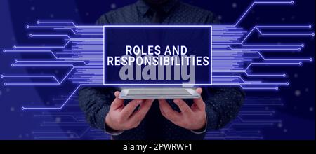 Hand writing sign Roles And Responsibilities, Business overview ...