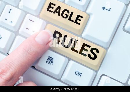 Sign displaying Eagle Rules, Concept meaning a huge set of design rules ...