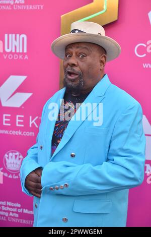 MIAMI, FL - APRIL 29:Carlon Thompson-Clinton and musician George ...
