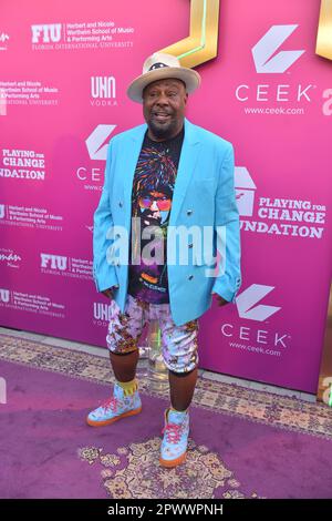 Carlon Thompson-Clinton (L) and musician George Clinton arrive for the ...