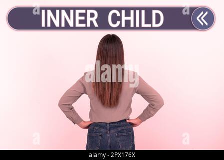 Sign displaying Inner Child. Concept meaning the childlike usually ...