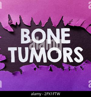 Hand writing sign Bone Tumors, Business overview can be either benign ...