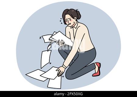 Unhappy businesswoman crying collect scattered on floor papers. Upset ...