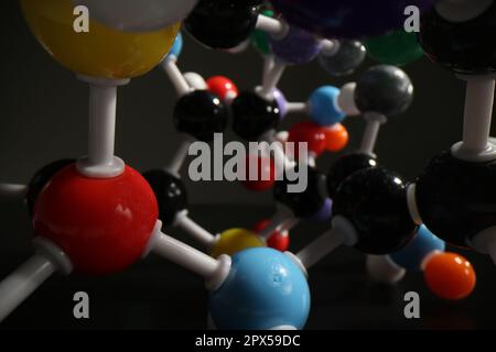Realistic model of molecular compounds on dark background Stock Photo ...