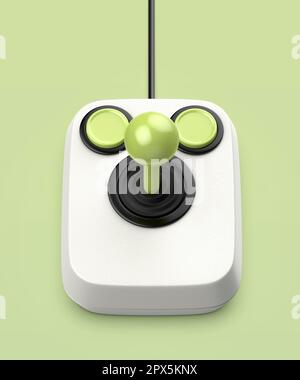 White vintage computer joystick on green background Stock Photo - Alamy