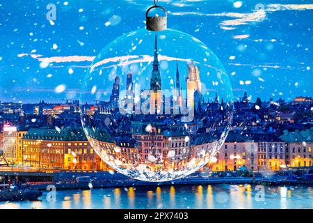 Stockholm skyline evening snow view through glass christmas ball, xmas ...