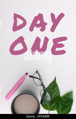 One day or day one. You decide. sign written on a wooden slat placed ...