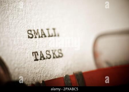 Small tasks text written with a typewriter Stock Photo - Alamy