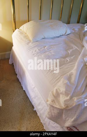Unmade bed, lonely Stock Photo - Alamy
