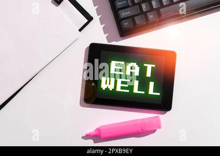 Hand writing sign Eat Well. Word Written on Practice of eating only ...