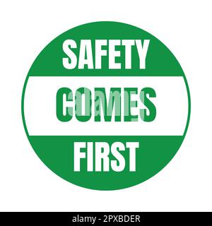 safety first round green sticker isolated on white Stock Photo - Alamy