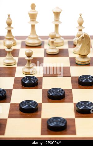 playing by different rules on the same board - black checkers and white ...