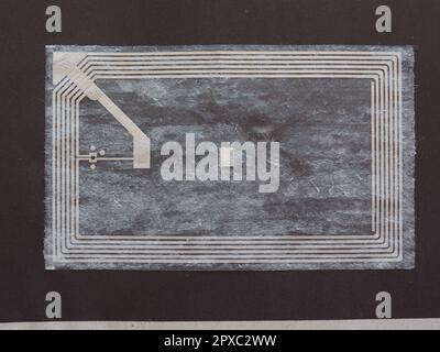 Near field contact antenna and chip in electronic ticket Stock Photo ...