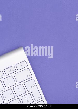 Paper with important text near keyboard. Information written on ...