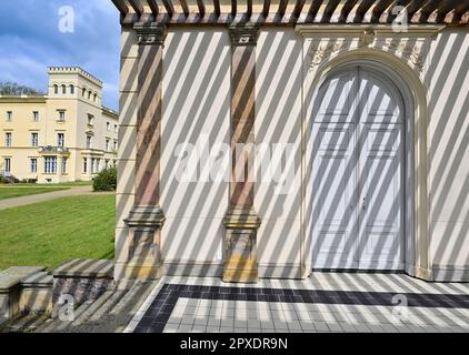 02 May 2023, Brandenburg, Steinhöfel: View of Steinhöfel Castle through ...
