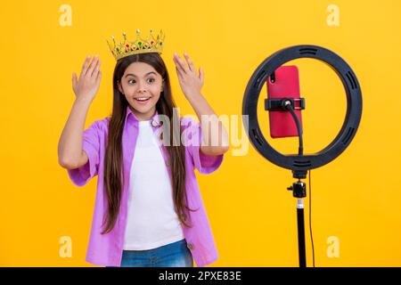 surprised teen girl influencer with crown on background. photo of teen ...