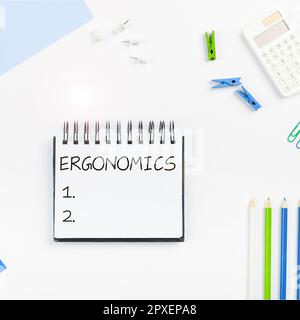 Hand writing sign Ergonomics, Word for fitting or designing a workplace ...
