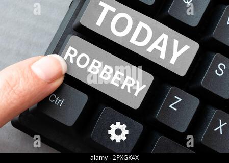 Text sign showing Robbery, Business idea the action of taking property ...