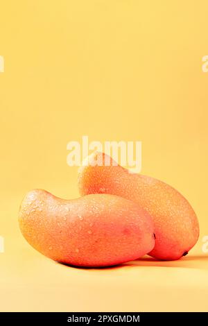 The fresh mangoes were dripping with water Stock Photo - Alamy