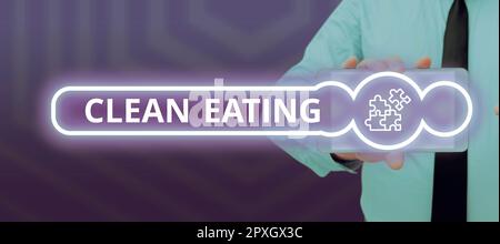 Hand writing sign Clean Eating. Concept meaning Practice of eating only ...
