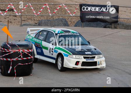 David Wood racing a Mitsubishi Evo competing in the Corbeau Seats rally ...