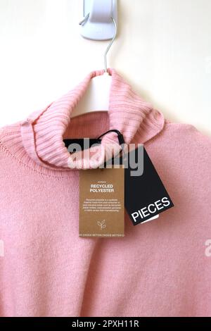 Recycled Polyester Pink Turtle Neck Jumper with Labels Stock Photo - Alamy