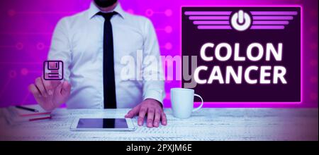 Hand writing sign Colon Cancer, Word for Cancer that forms in the ...