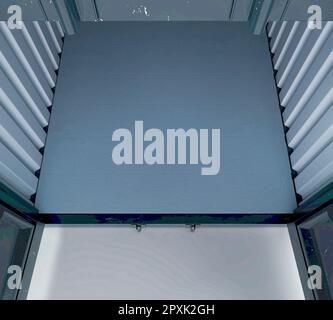 A shipping container with open doors and a locking mechanism on an ...