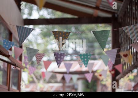 Color flags decorated in coffee shop, stock photo Stock Photo - Alamy