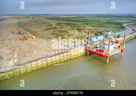 Mobile working rig positioned for repair works to the damaged sea wall ...