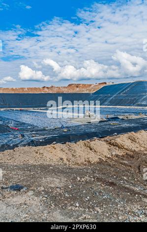 Geomembranes cover a lot of ground in an active landfill Stock Photo ...