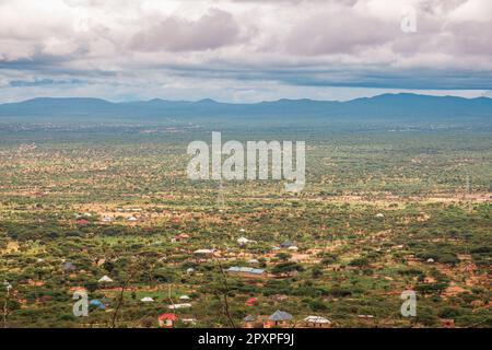Aerial view of Longido township in Tanzania with Mount Meru at the ...