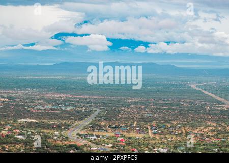 Aerial view of Longido township in Tanzania with Mount Meru at the ...