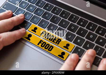 Sign displaying Finger Food, Word Written on products and digestives ...