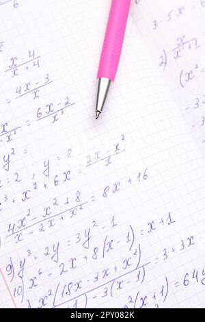 Sheet of paper with mathematical formulas and pen Stock Photo - Alamy