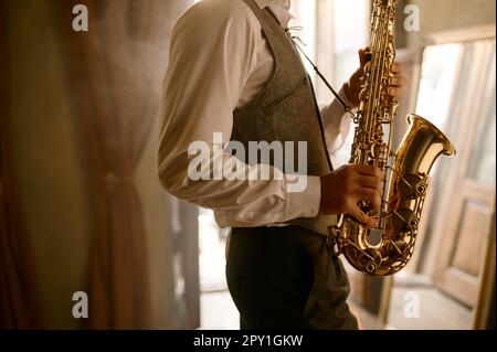 Making music with air. Cropped shot of an unrecognizable male musician ...