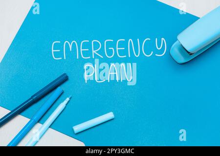Sign displaying Emergency Plan. Word Written on Procedures for response ...