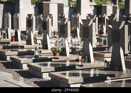 Many granite tombstones at cemetery. Religious tradition Stock Photo ...