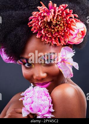 Flowers always make people better. Shot of a unrecognizable florist ...
