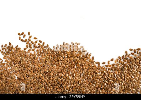 Creative layout made of organic flax seeds isolated on white background. Flat lay. Food concept ...