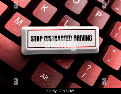 Sign displaying Stop Distracted Driving. Word Written on asking to be ...