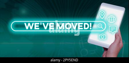 Hand writing sign We'Ve Moved. Business idea going to live from place ...