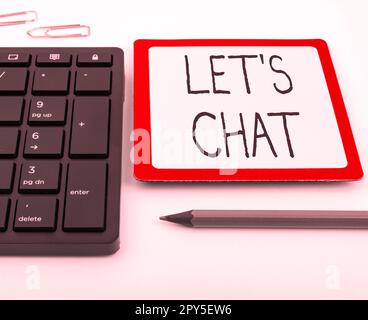 Text sign showing LET'S CHAT. Conceptual photo inviting the person to ...