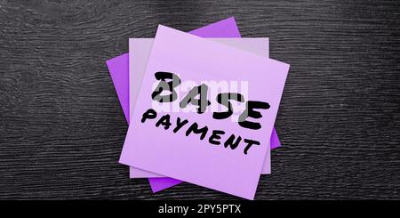 Hand writing sign Base Payment. Internet Concept amount of pay for a ...