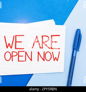 Sign displaying We Are Open Now, Word Written on no enclosing or ...