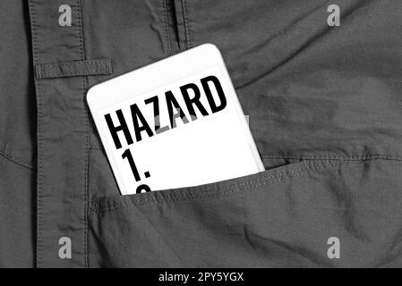 Sign displaying Hazard, Word Written on account or statement describing ...