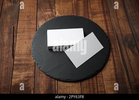 Business cards, slate plate Stock Photo - Alamy