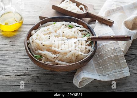 Traditional fresh and healthy sour turnip in glass jar on wooden ...